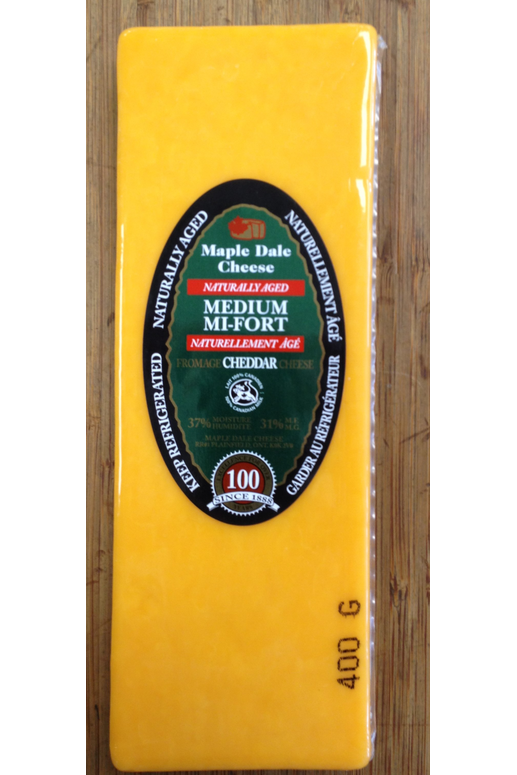description features maple dale cheese co s medium cheddar cheese has a ...